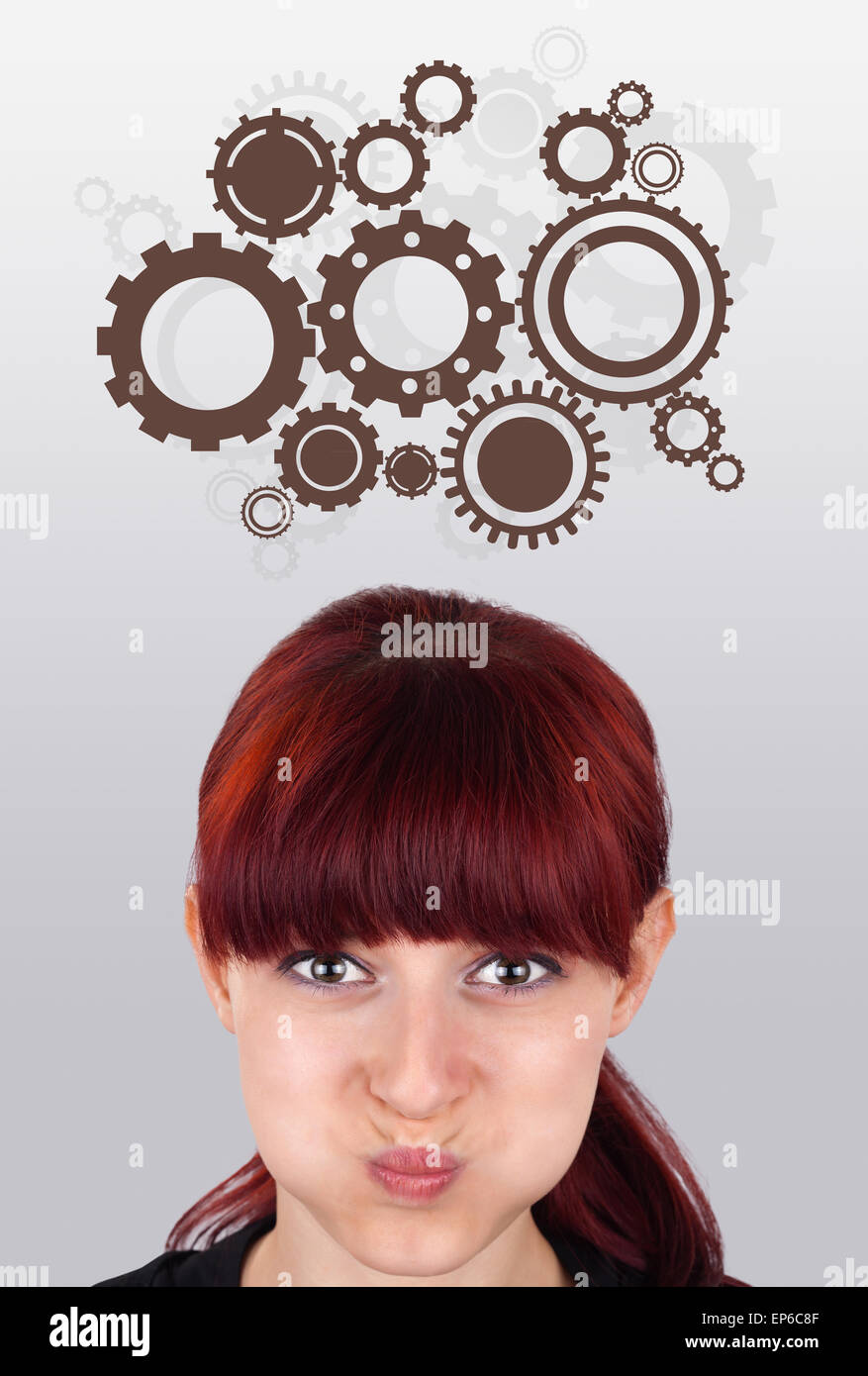 Young girl looking at idea type of sign Stock Photo - Alamy