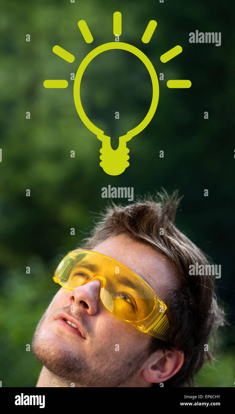 Young person looking at idea type of sign Stock Photo - Alamy