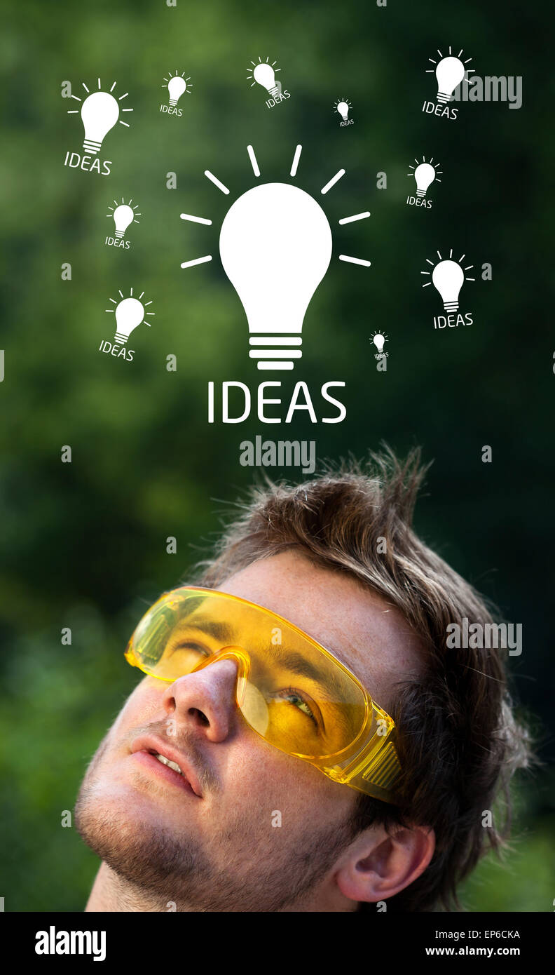 Young person looking at idea type of sign Stock Photo - Alamy