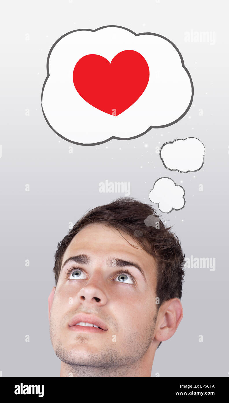 Young head looking at love type of icons Stock Photo - Alamy