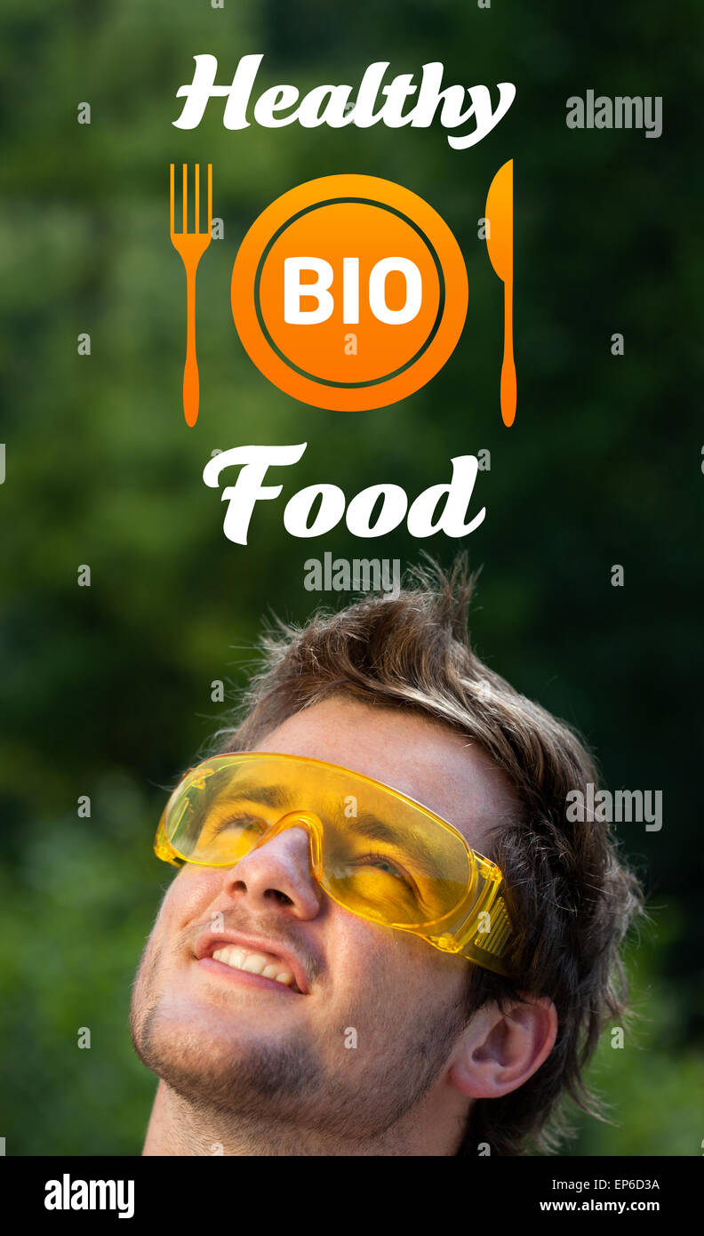 Young head looking at healthy food sign Stock Photo - Alamy