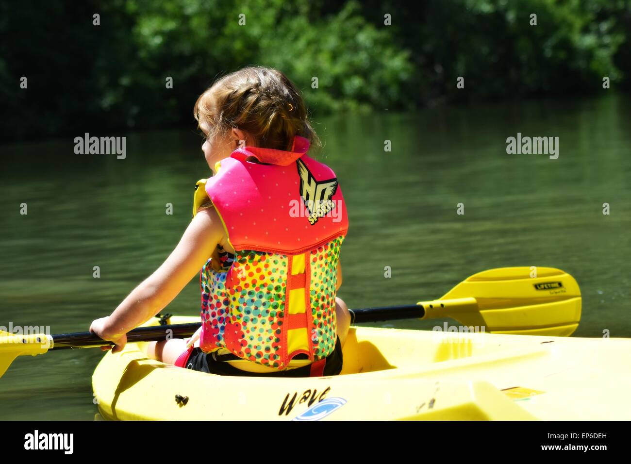 Girl kayaking on the river Stock Photo - Alamy