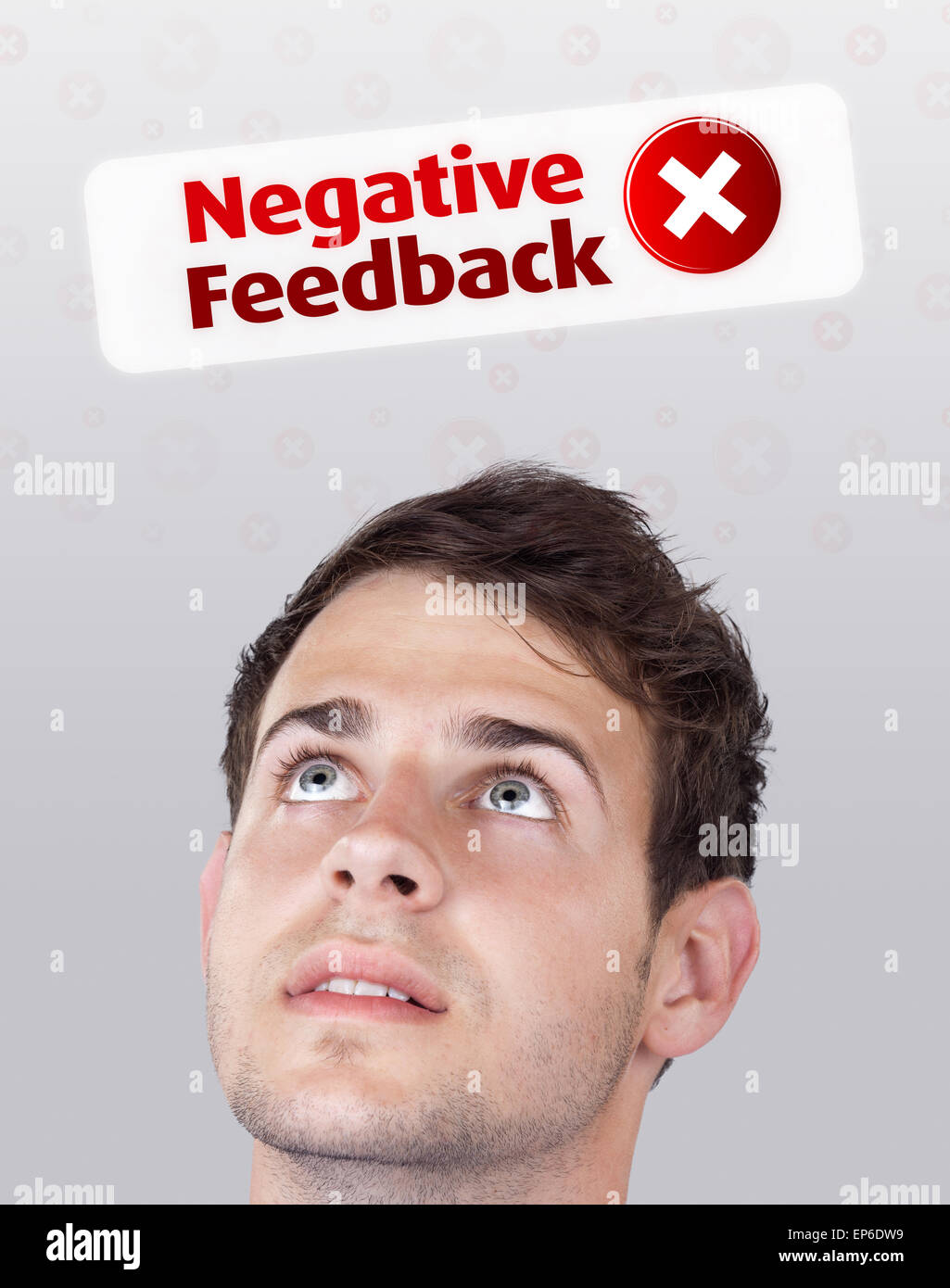 Young head looking at positive negative signs Stock Photo - Alamy
