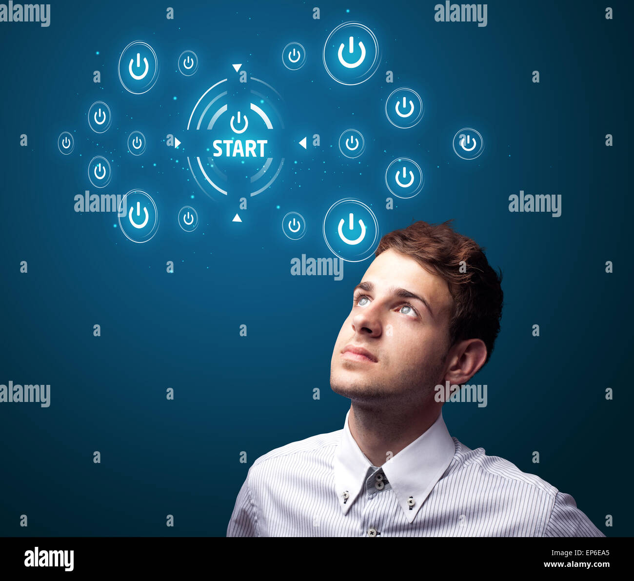 Businessman pressing simple type of start buttons Stock Photo - Alamy
