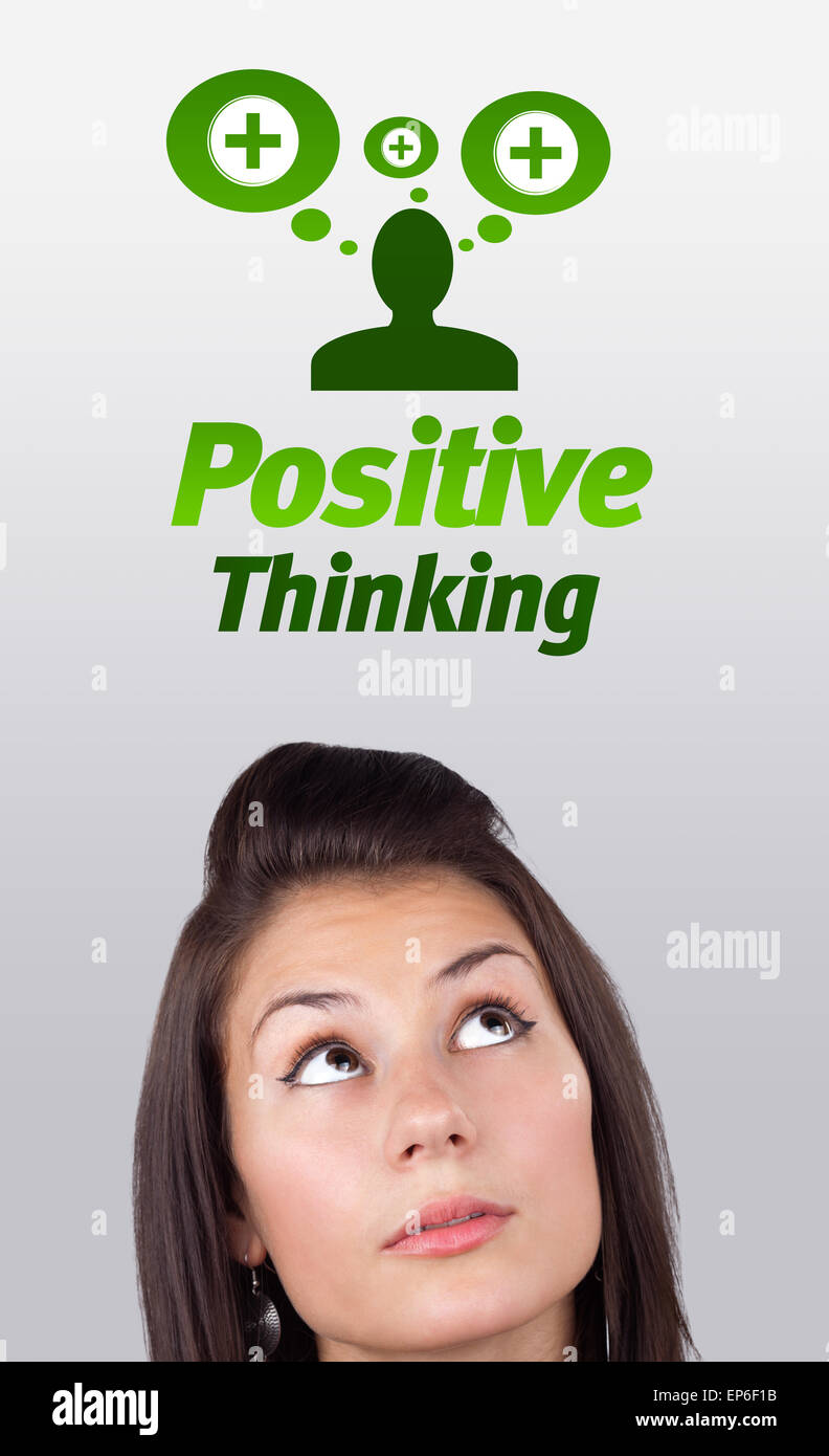 Young girl looking at positive negative signs Stock Photo - Alamy