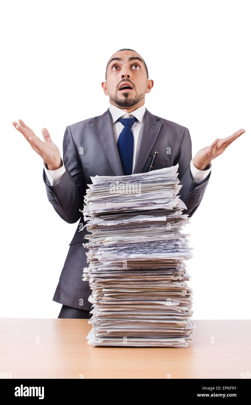 Man with too much work to do Stock Photo - Alamy