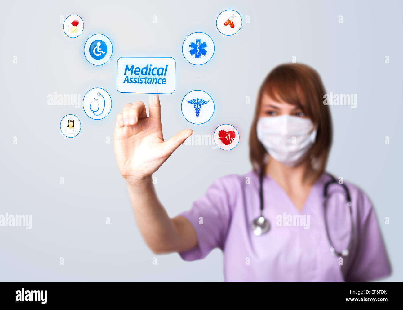 Woman doctor pressing digital button Stock Photo - Alamy