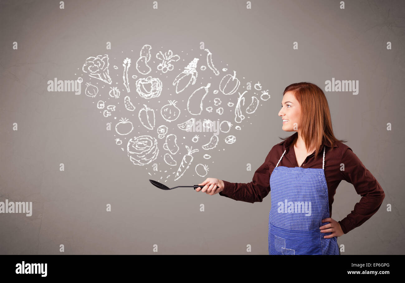 Woman cooking vegetables Stock Photo - Alamy