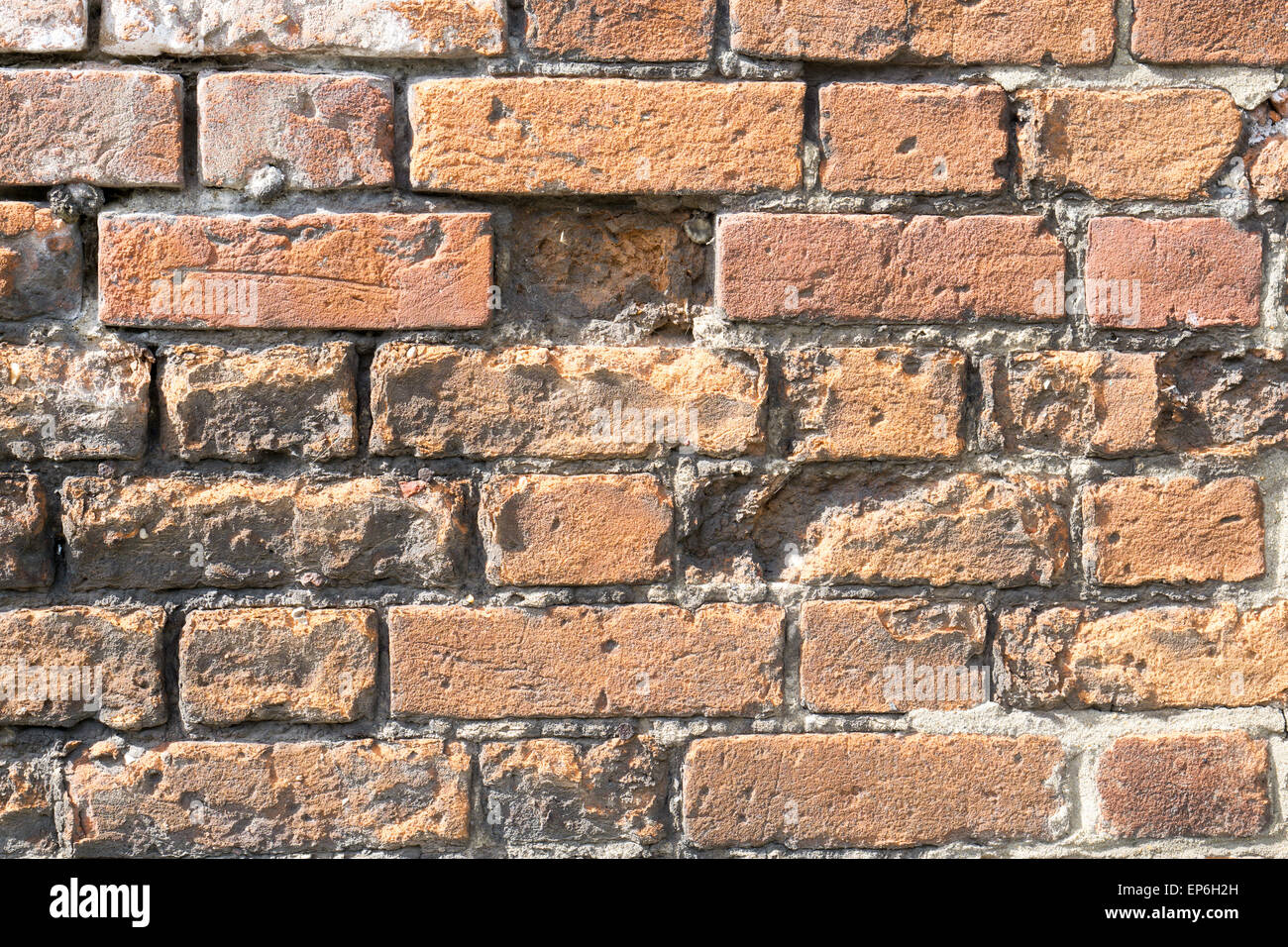 Closeup of broken bricks of a vintage wall for background Stock Photo ...