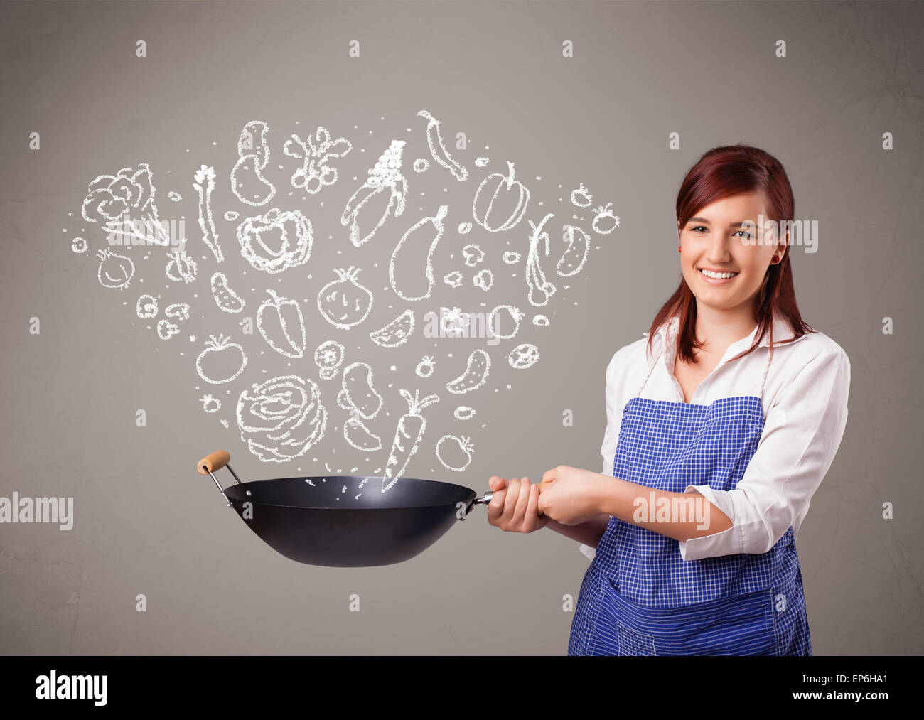 Woman cooking vegetables Stock Photo - Alamy