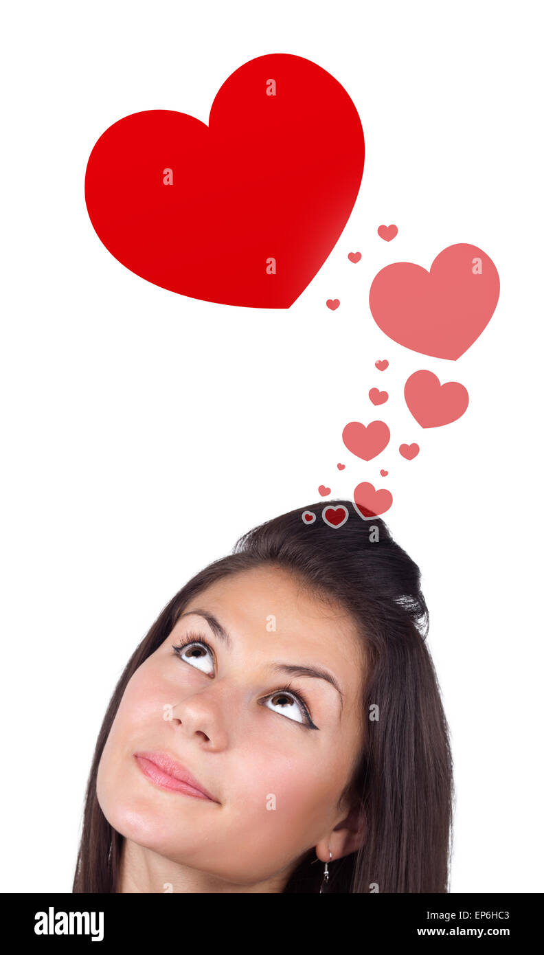 Young girl looking at love type of icons Stock Photo - Alamy