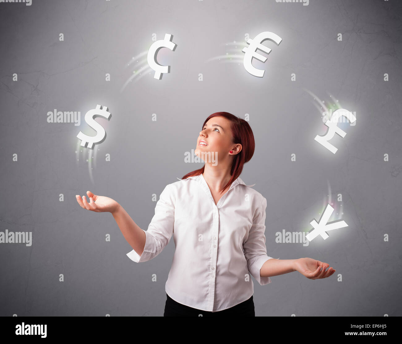 young lady standing and juggling with currency icons Stock Photo - Alamy
