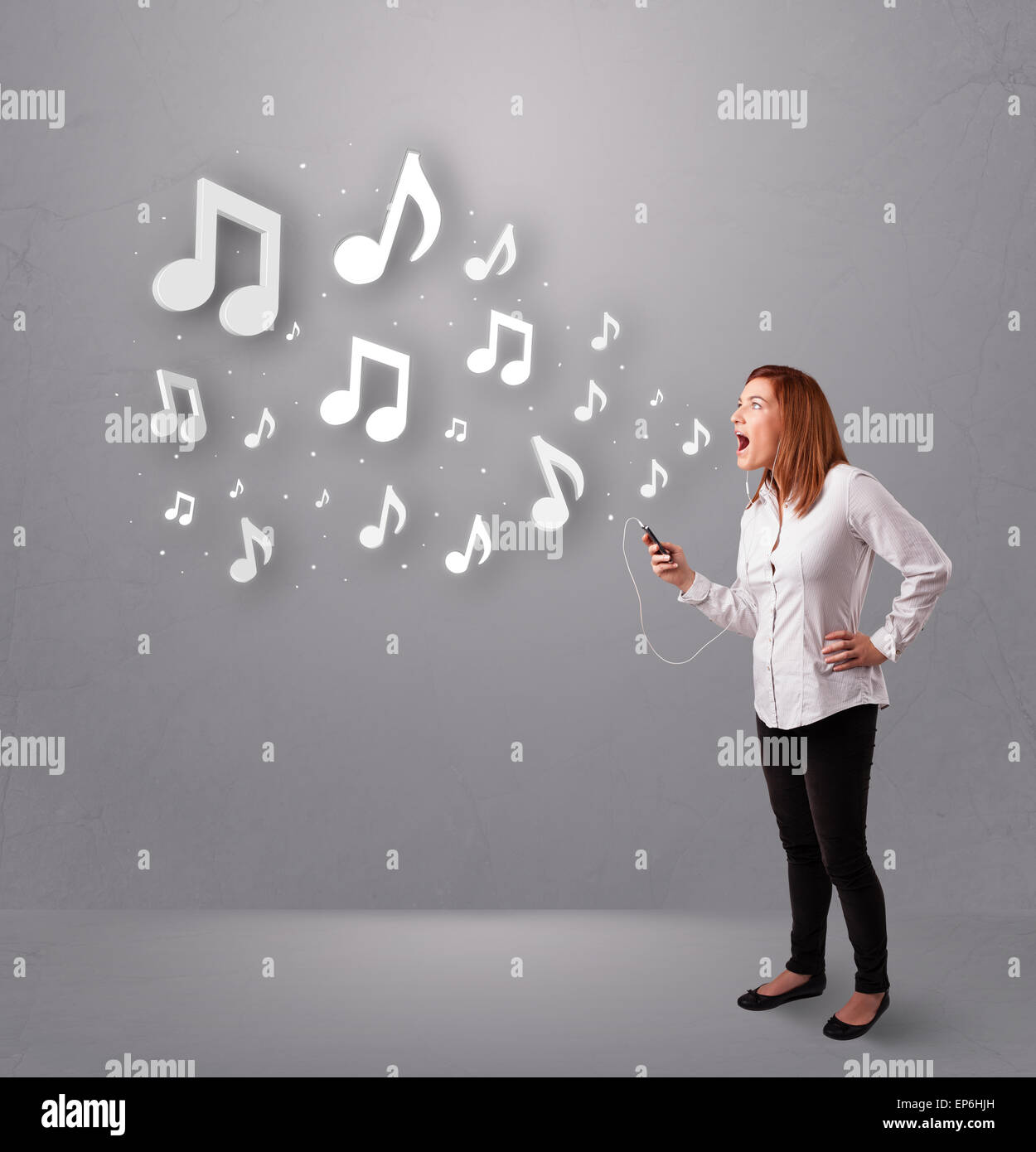 Pretty young woman singing and listening to music with musical notes ...