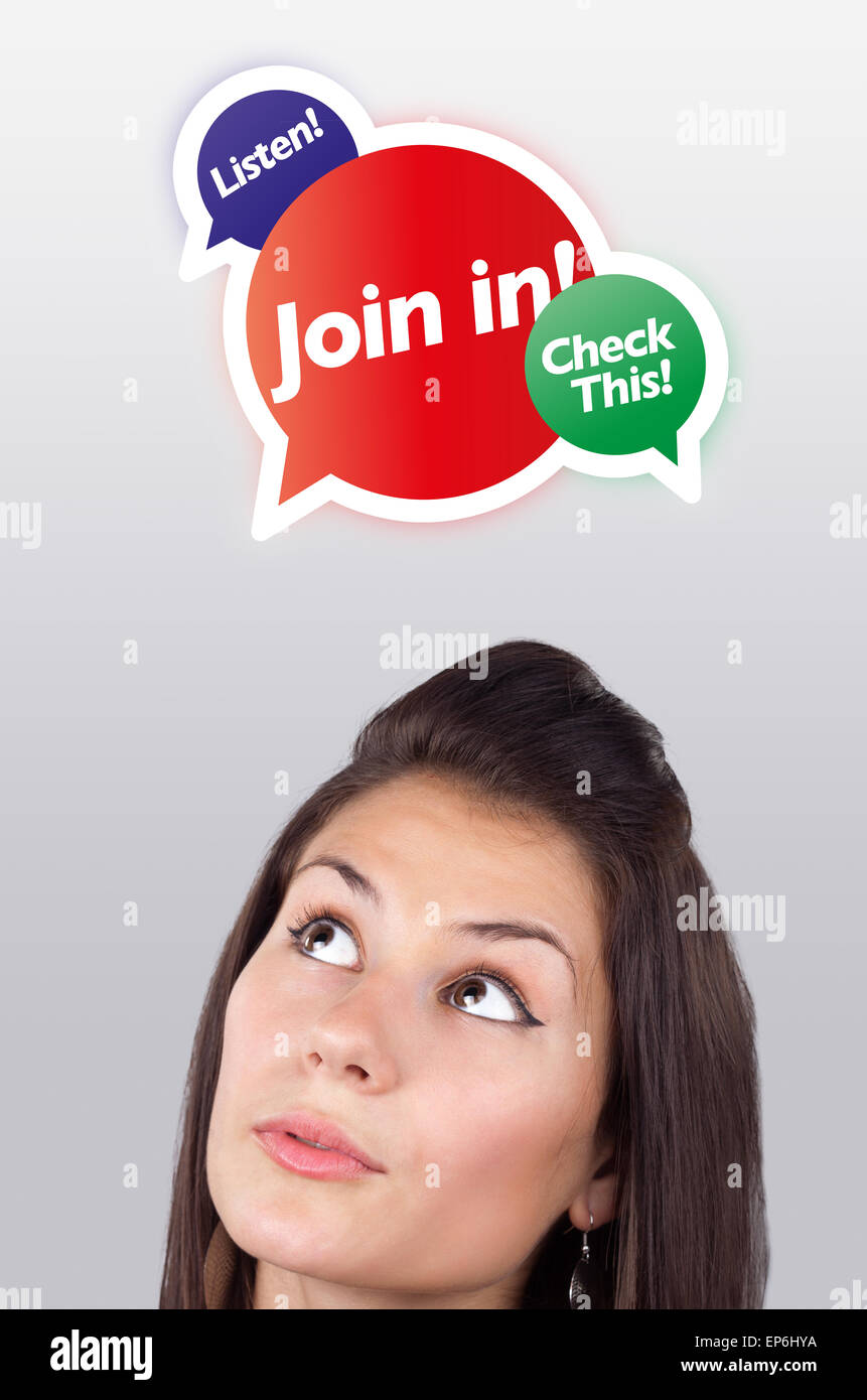 Young girl looking at internet type of icons Stock Photo - Alamy