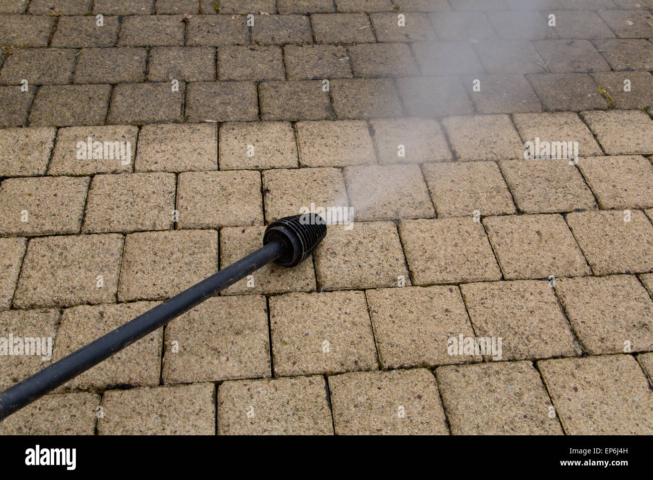 Outdoor floor cleaning with high pressure water jet Stock Photo - Alamy