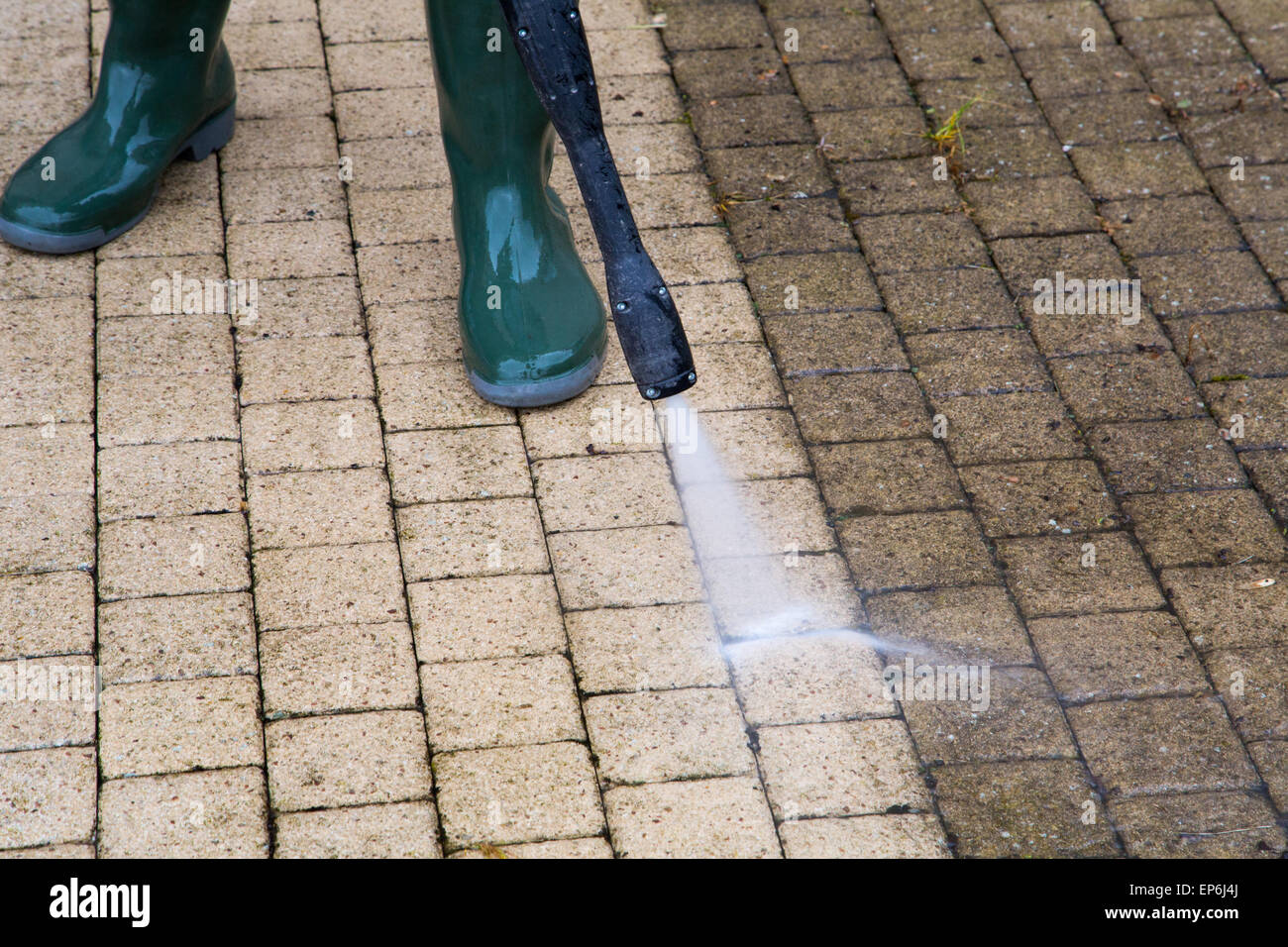 Outdoor floor cleaning with high pressure water jet Stock Photo - Alamy
