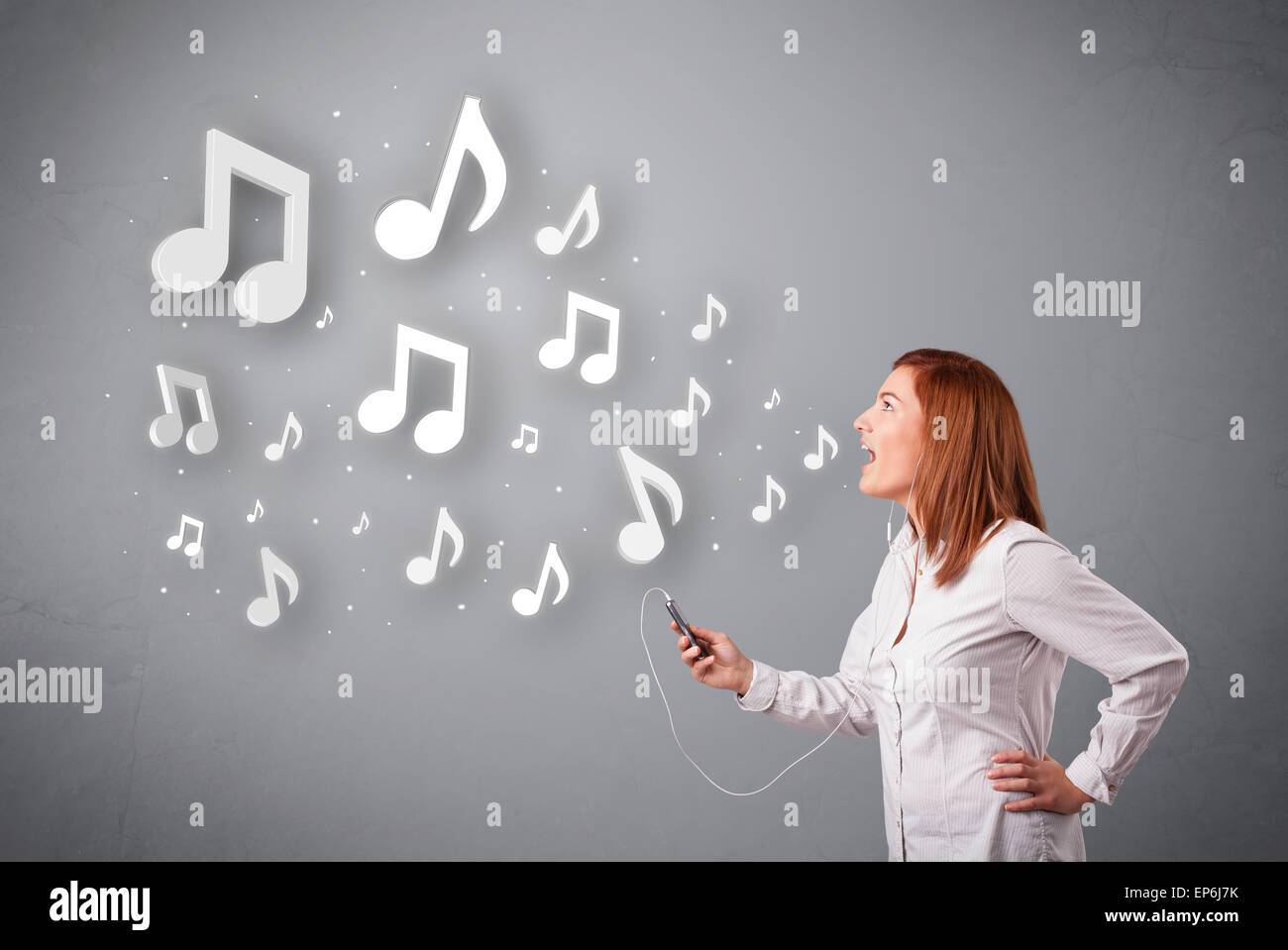 Pretty young woman singing and listening to music with musical notes ...