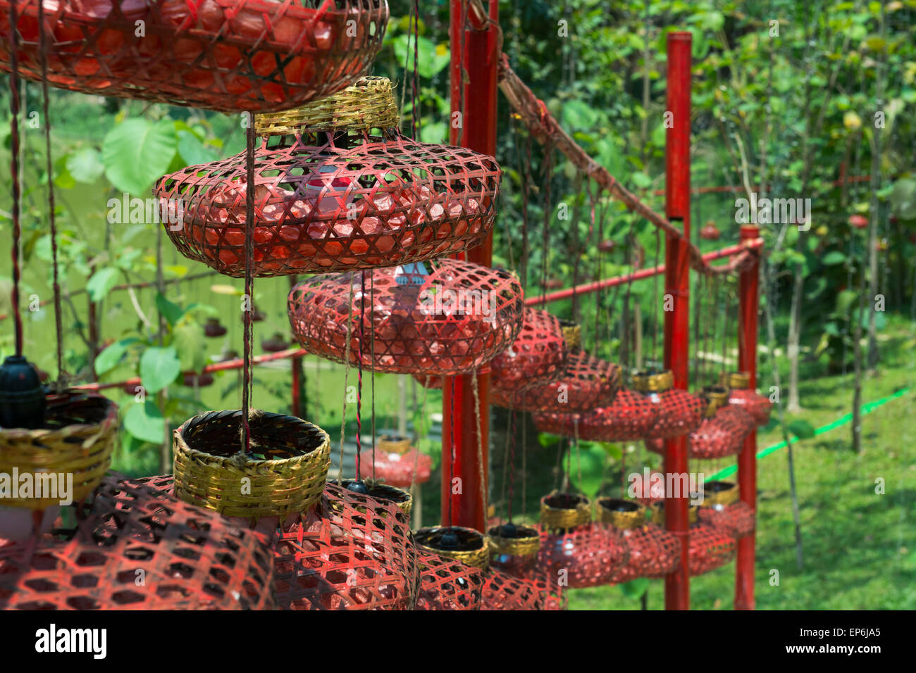 Myanmar (aka Burma), Yangon (aka Rangoon). Red bamboo hanging garden ...