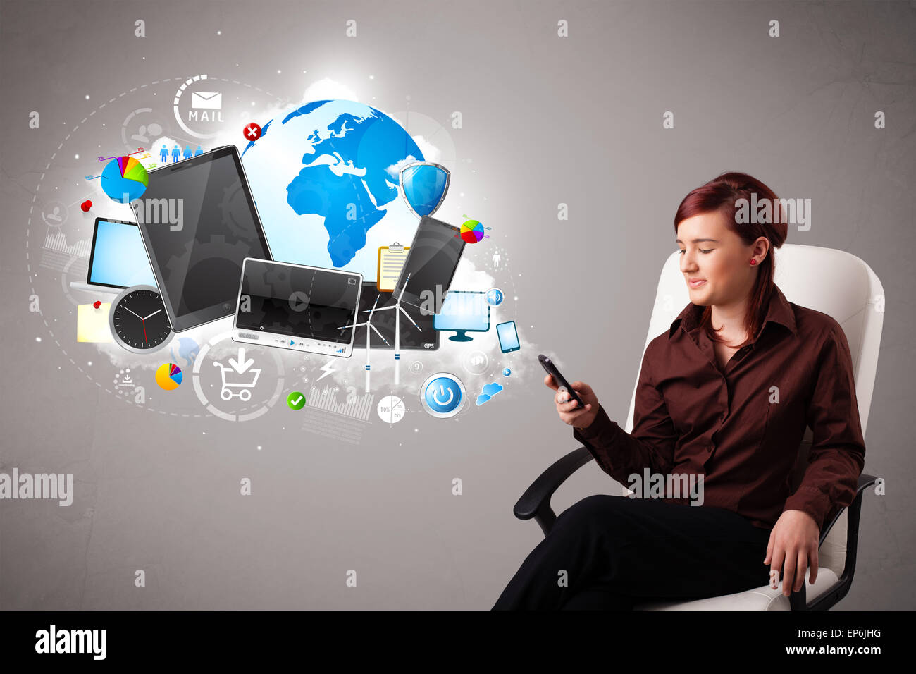 young woman sitting and browsing on her phone Stock Photo - Alamy