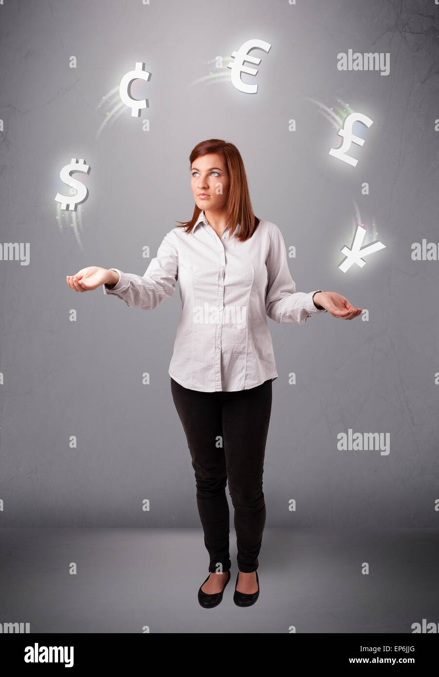young lady standing and juggling with currency icons Stock Photo - Alamy