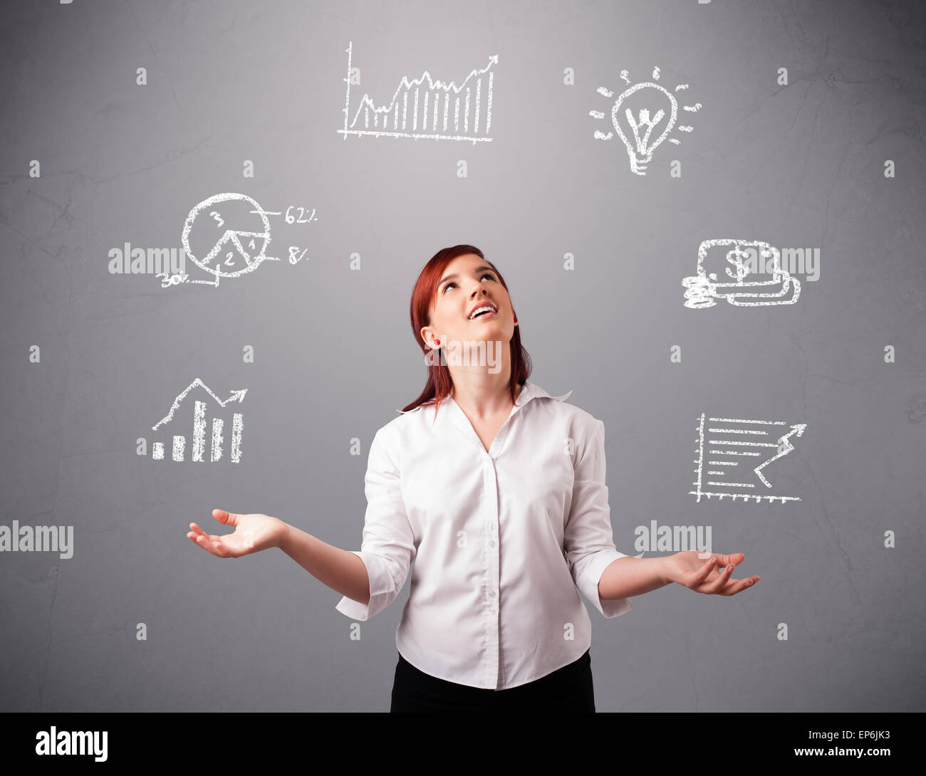 beautiful young woman juggling with statistics and graphs Stock Photo ...