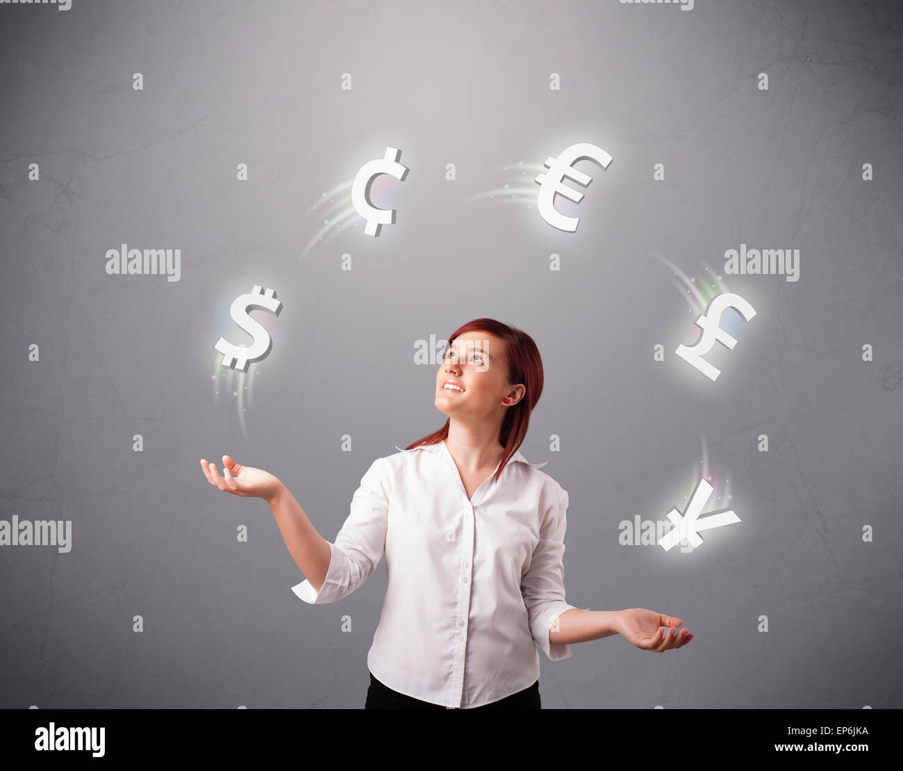 young lady standing and juggling with currency icons Stock Photo - Alamy