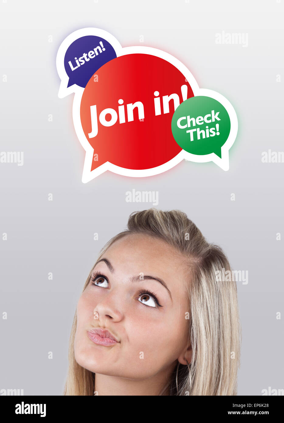 Young girl looking at internet type of icons Stock Photo - Alamy