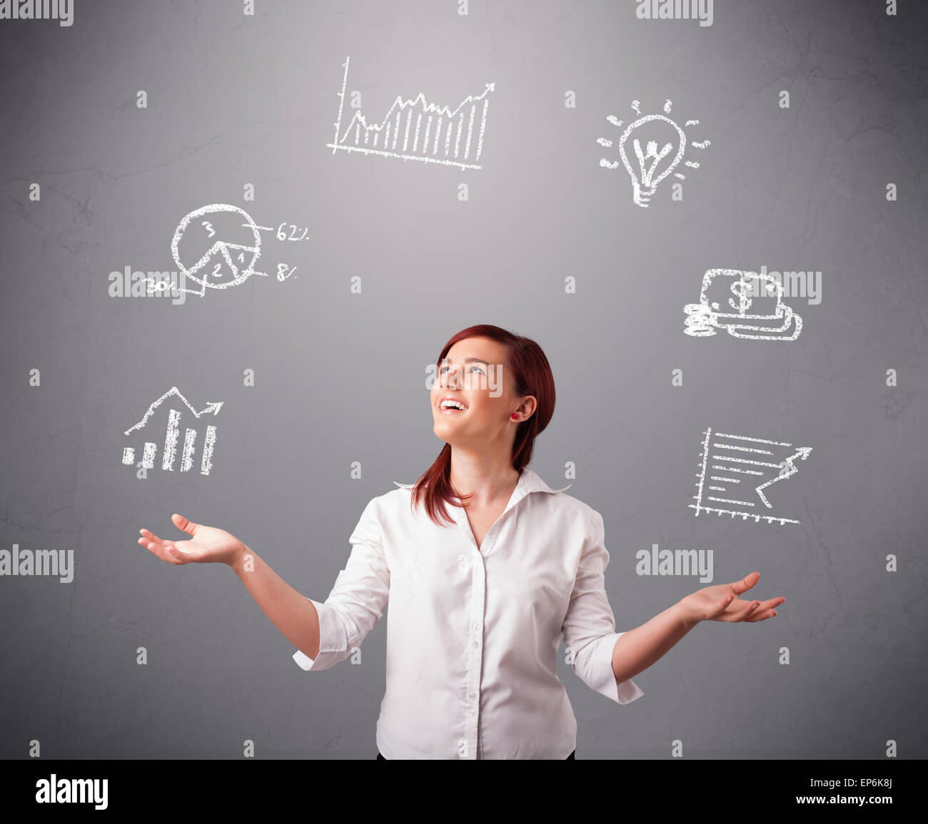 beautiful young woman juggling with statistics and graphs Stock Photo ...