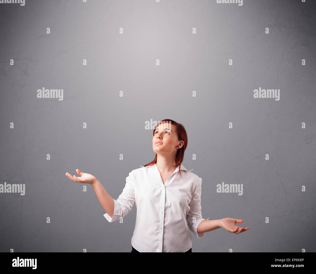 beautiful young lady juggling with copy space Stock Photo - Alamy