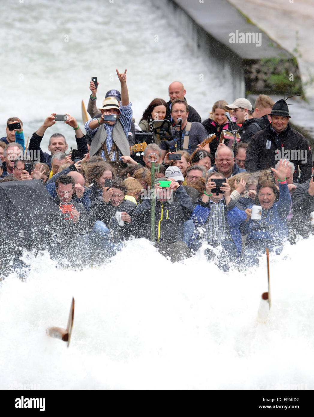 A group of day-trippers ride down the raft chute during a raft ride on ...