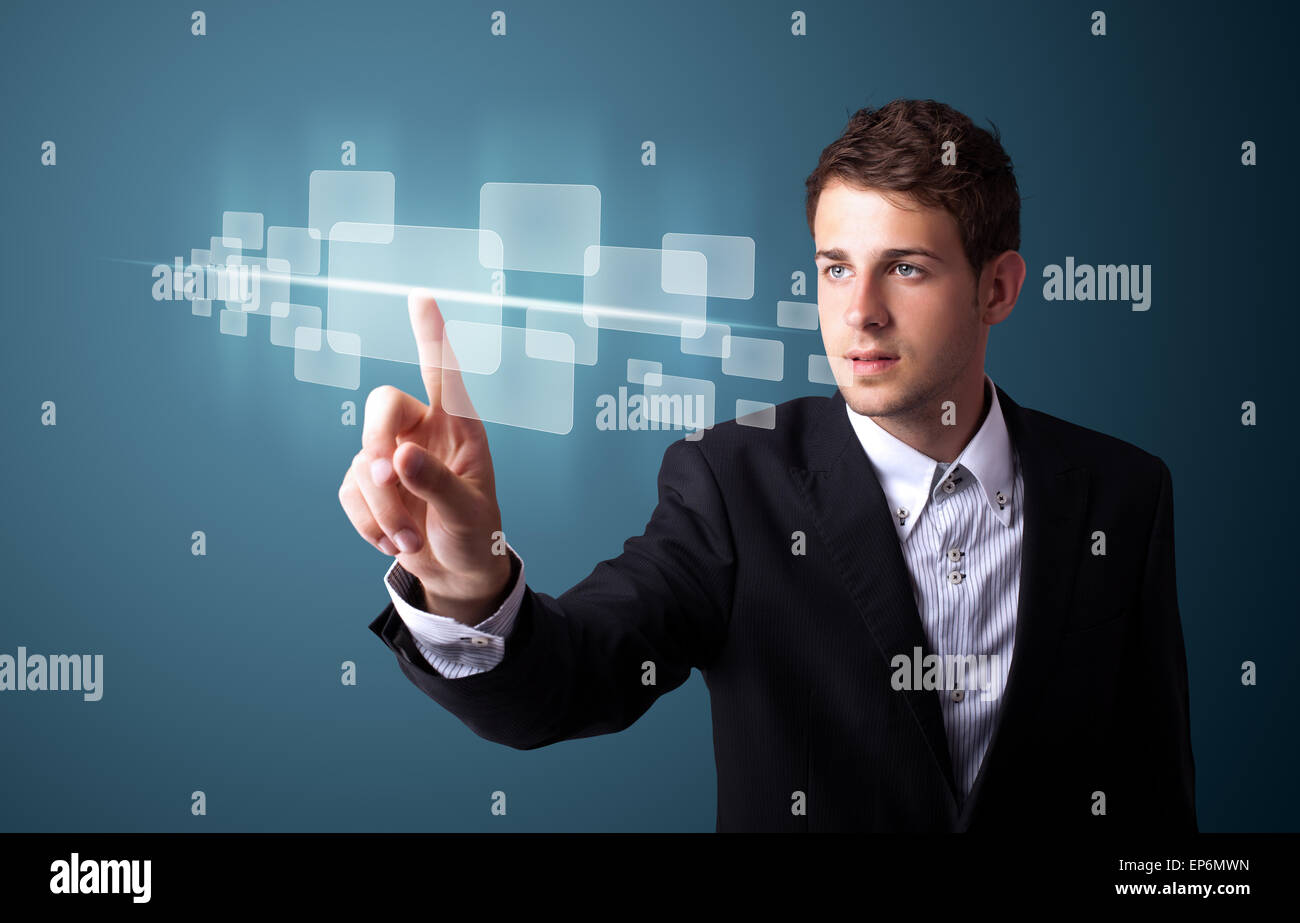 Businessman pressing high tech type of modern buttons Stock Photo - Alamy