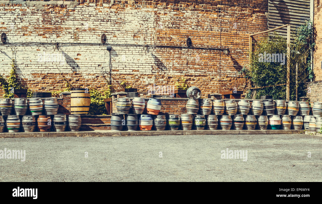 Steel kegs of beer in storage yard panoramic view Stock Photo - Alamy