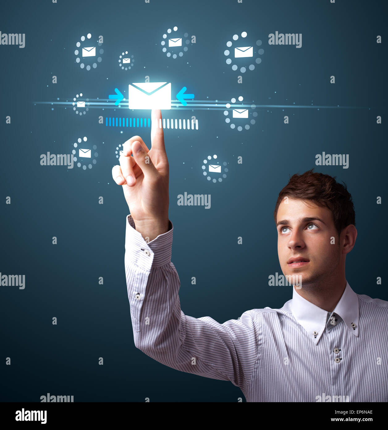 Businessman pressing virtual messaging type of icons Stock Photo - Alamy