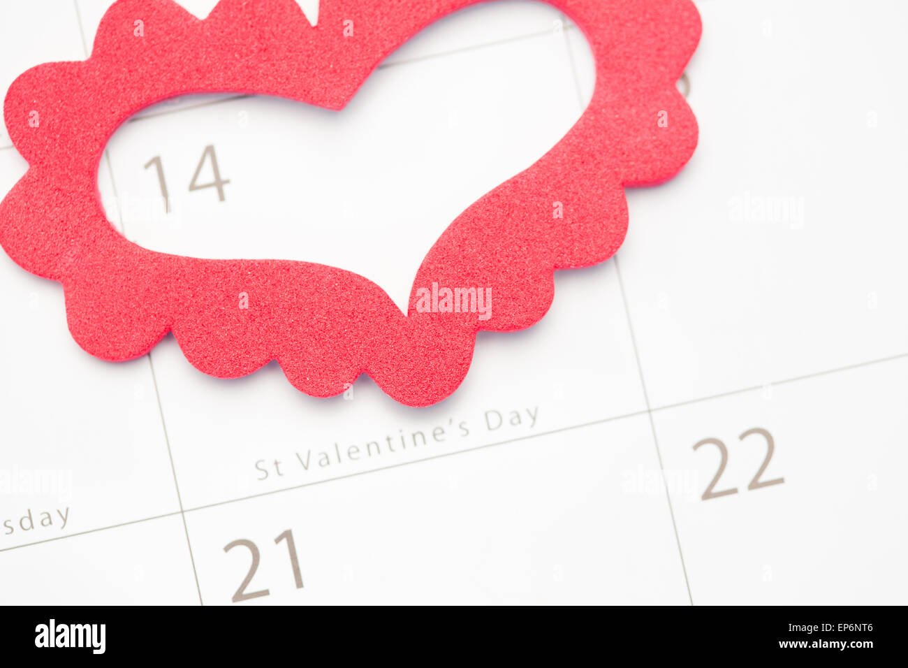 Pink heart marking out valentines day on calendar Stock Photo - Alamy
