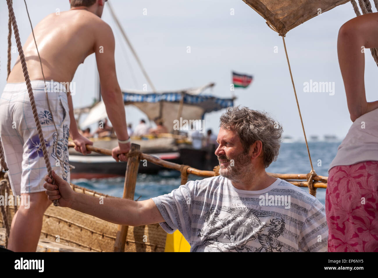 Tourists enjoying sea on yacht. Ship traveling in Kenya Stock Photo - Alamy