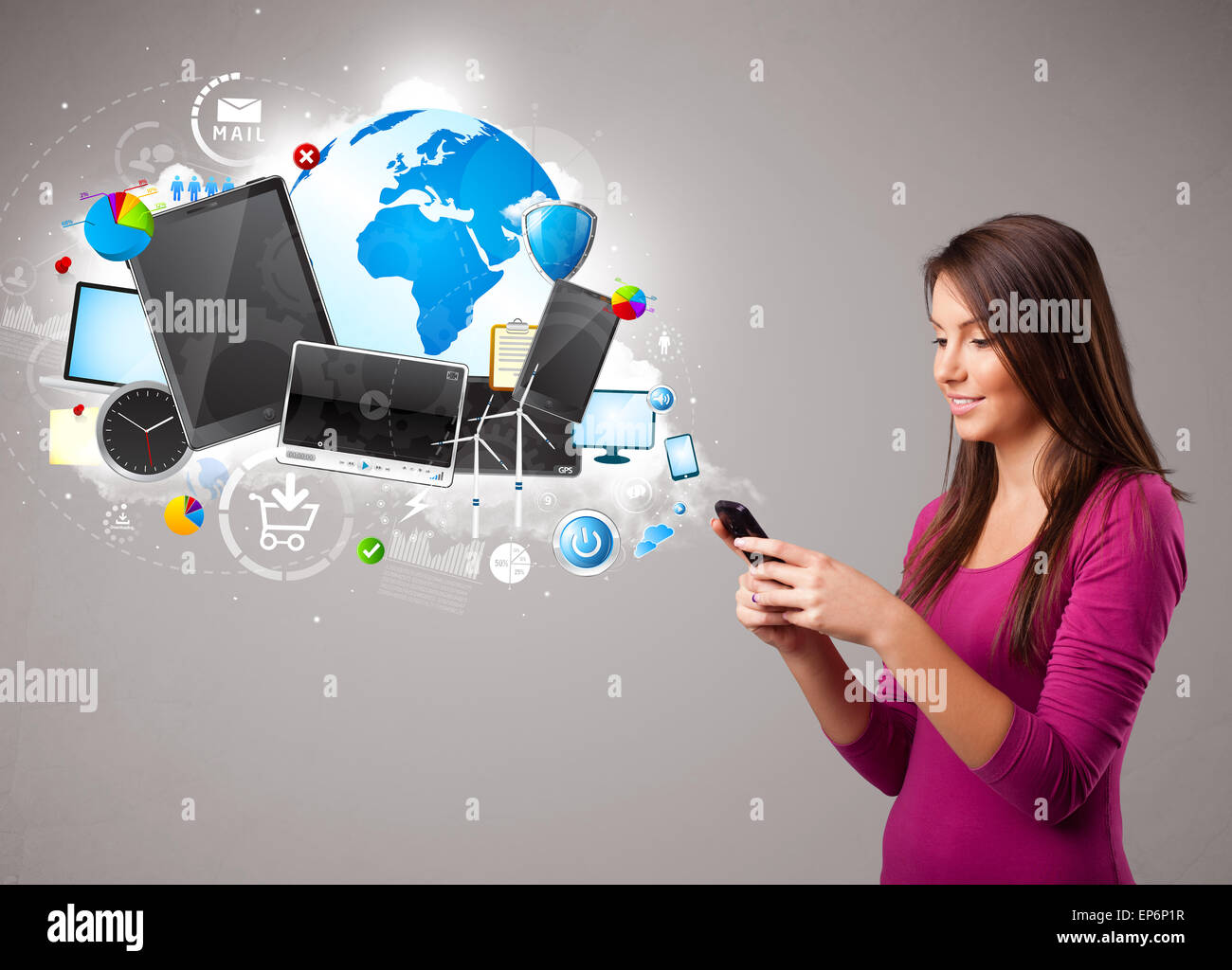 young woman standing and browsing on her phone Stock Photo - Alamy