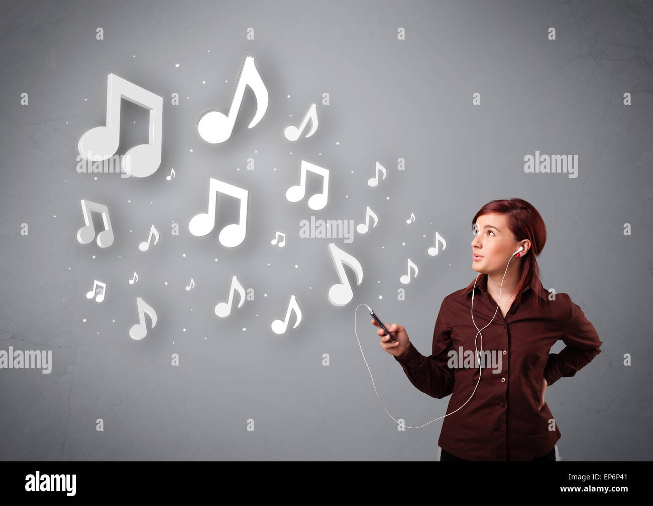 Pretty young woman singing and listening to music with musical notes ...