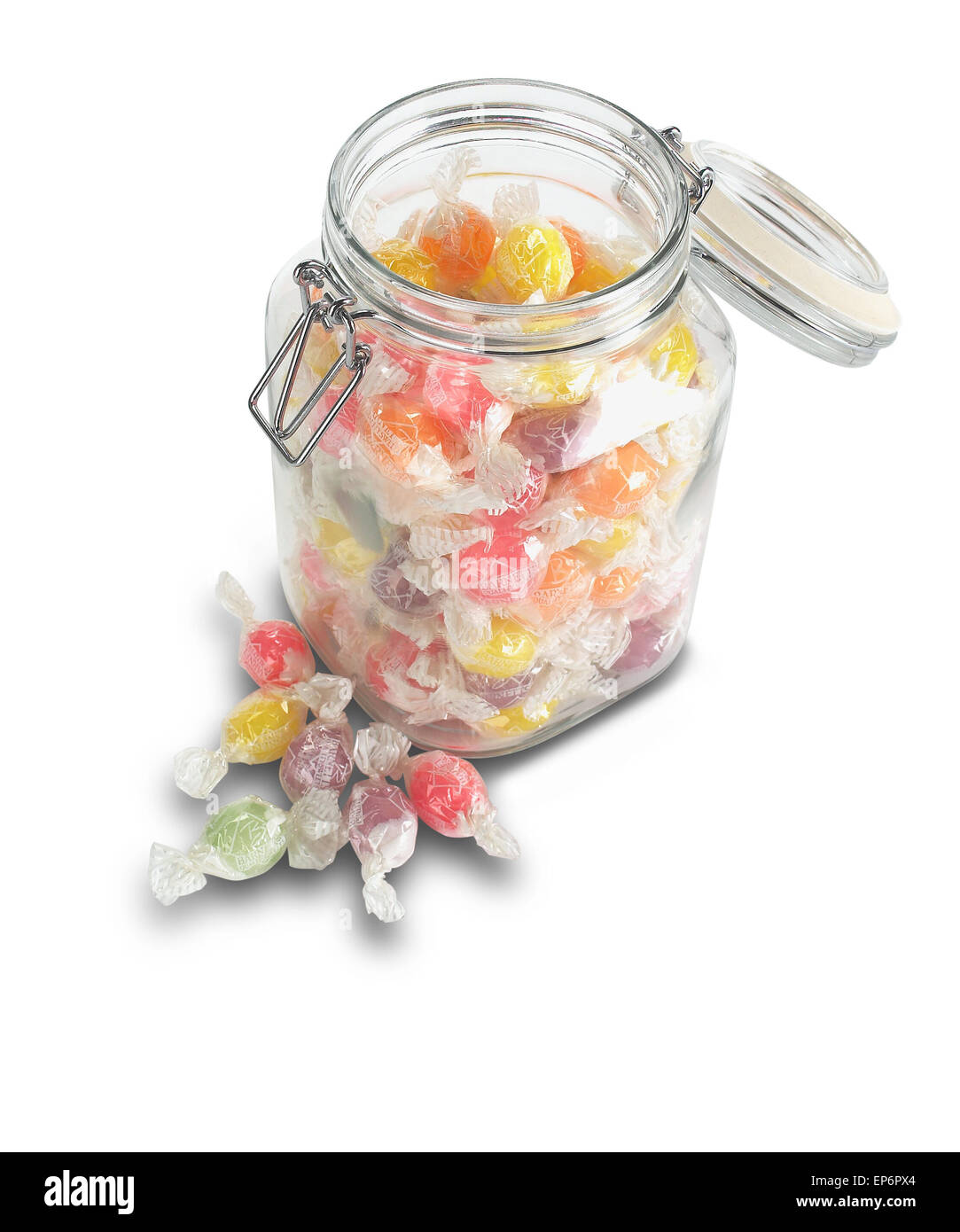 Sweets in, and next to, a large sweet (candy) jar Stock Photo - Alamy