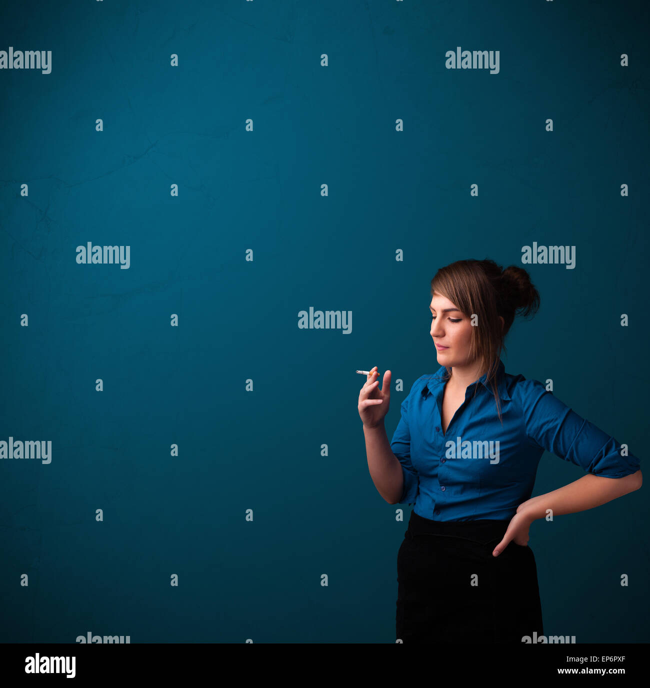 Beautiful woman smoking cigarette hi-res stock photography and images ...