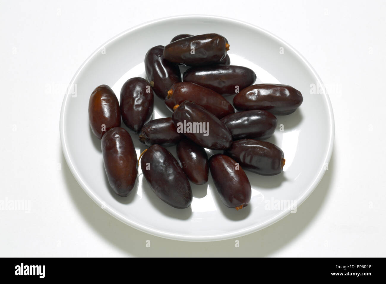 Fresh dates on plate hi-res stock photography and images - Alamy