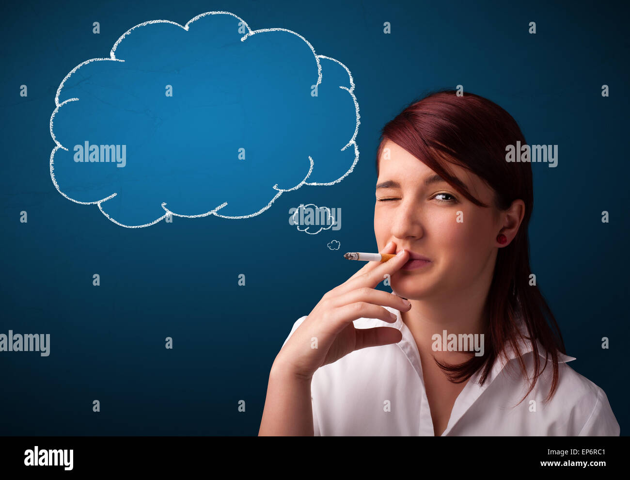 Beautiful lady smoking cigarette with idea cloud Stock Photo - Alamy