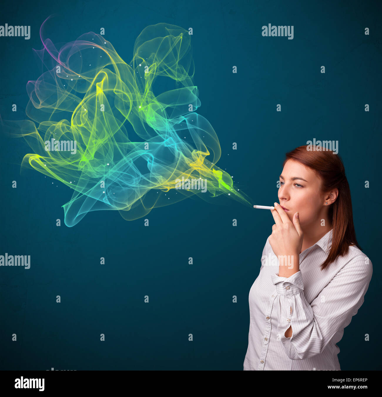 Pretty lady smoking cigarette with colorful smoke Stock Photo - Alamy