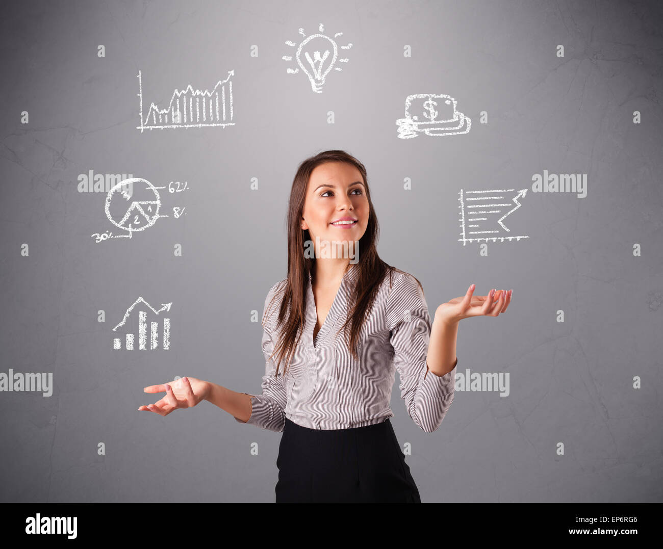 beautiful young woman juggling with statistics and graphs Stock Photo ...