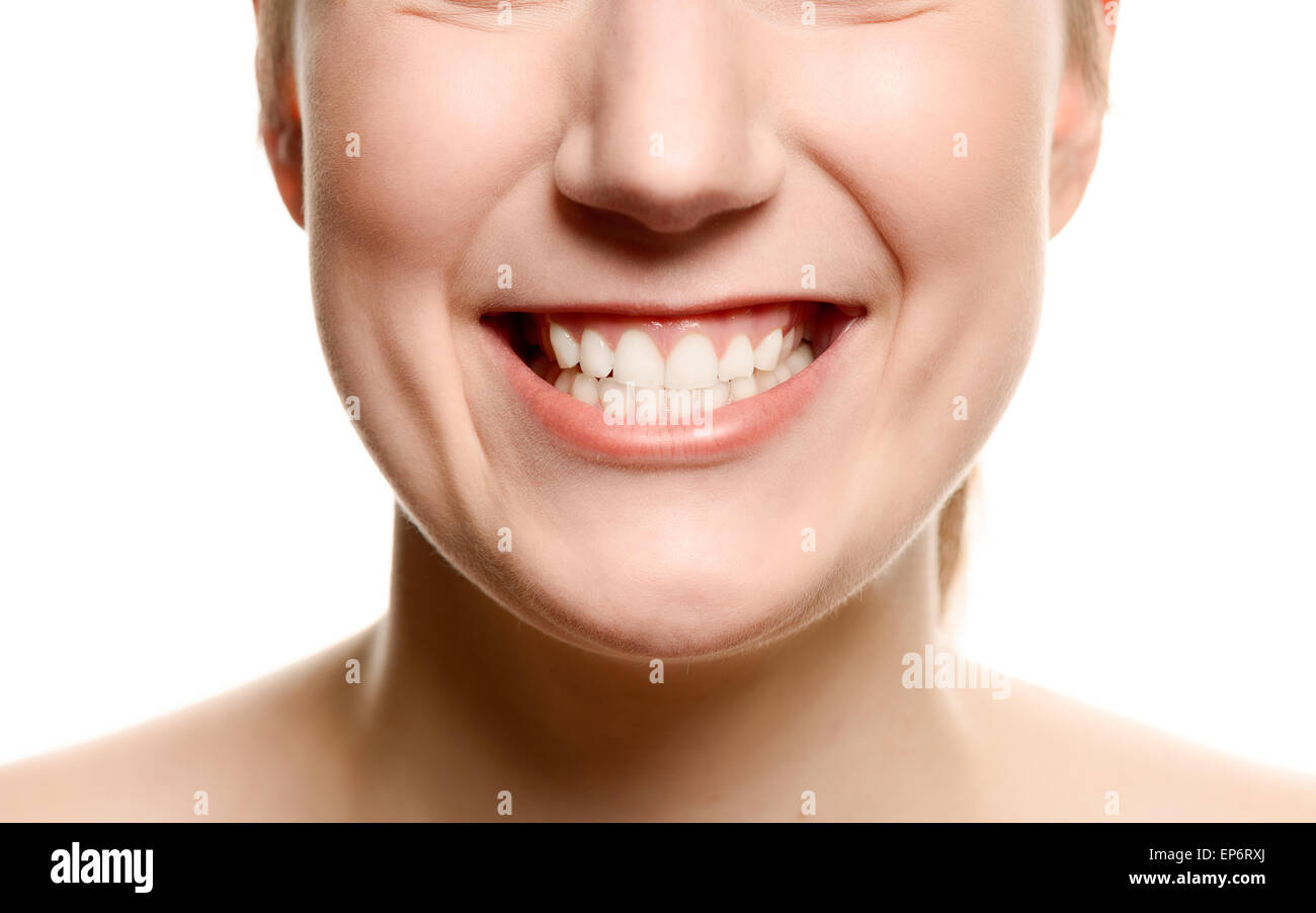 Woman smiling showing teeth hi-res stock photography and images - Alamy