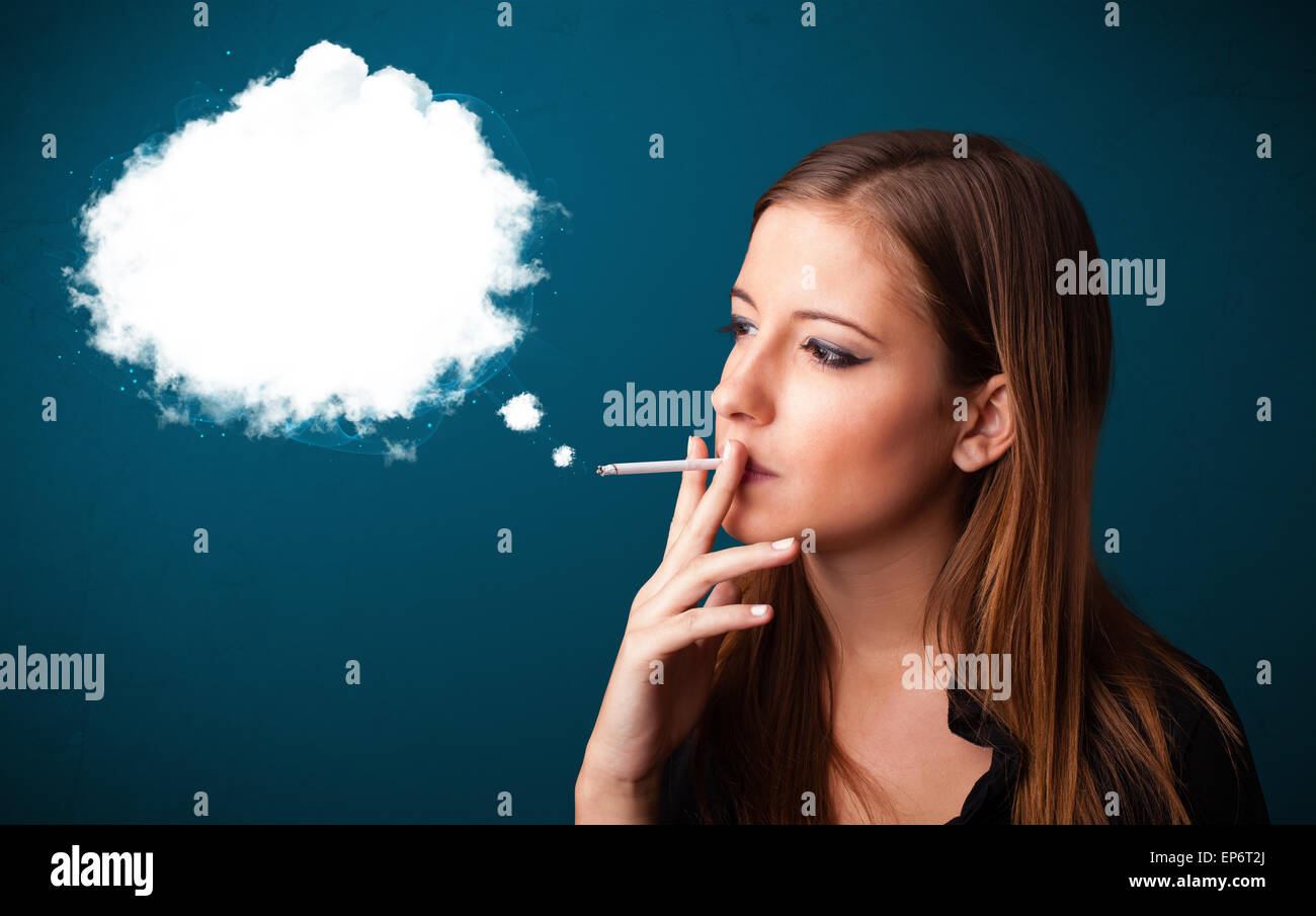 Young woman smoking unhealthy cigarette with dense smoke Stock Photo ...
