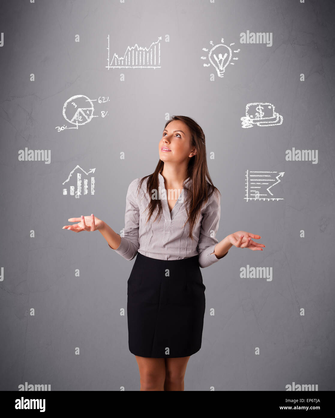beautiful young woman juggling with statistics and graphs Stock Photo ...