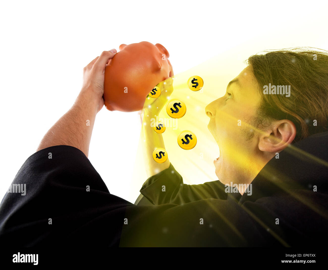 A guy finding treasure coins in a piggy bank Stock Photo - Alamy