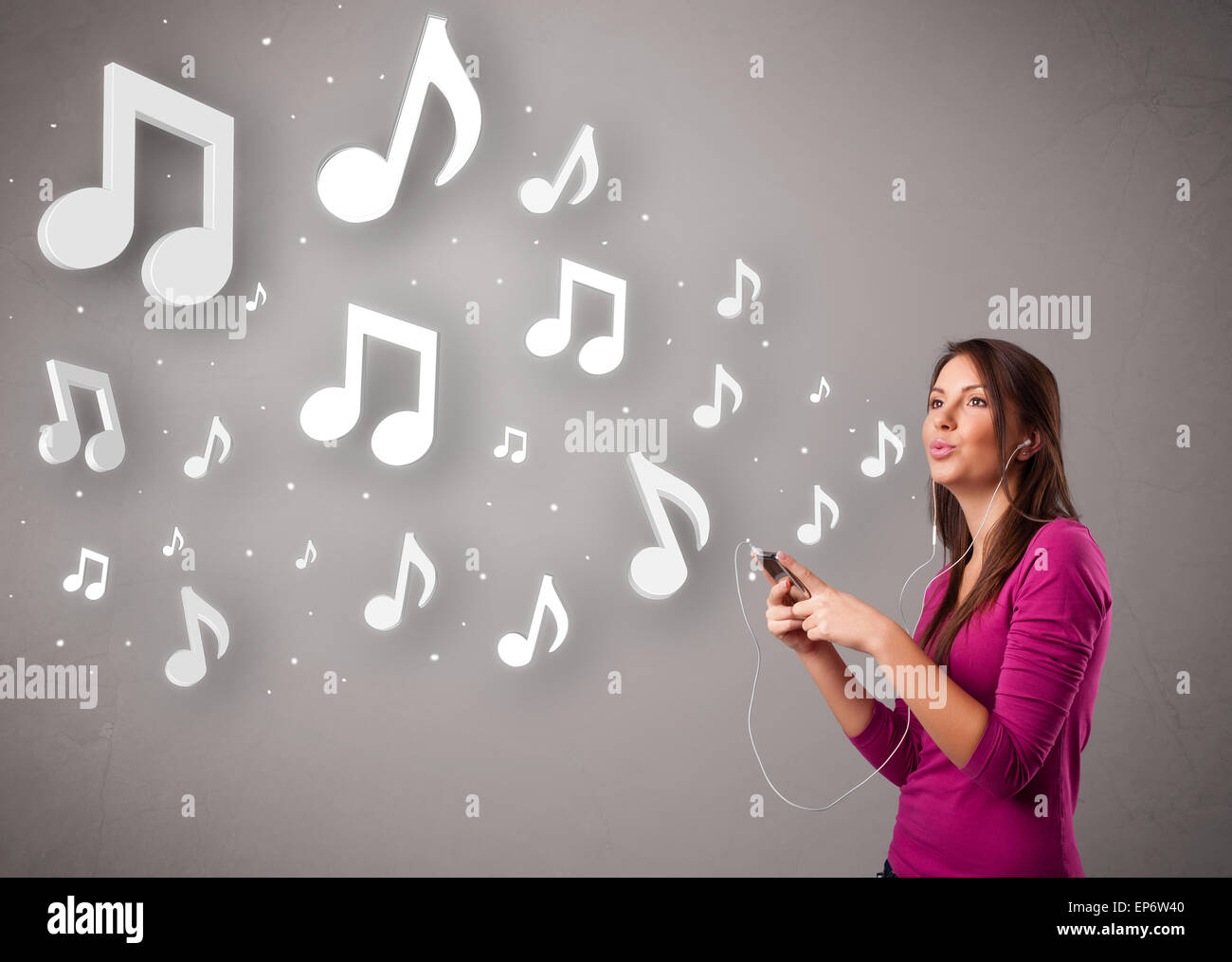 Pretty young woman singing and listening to music with musical notes ...