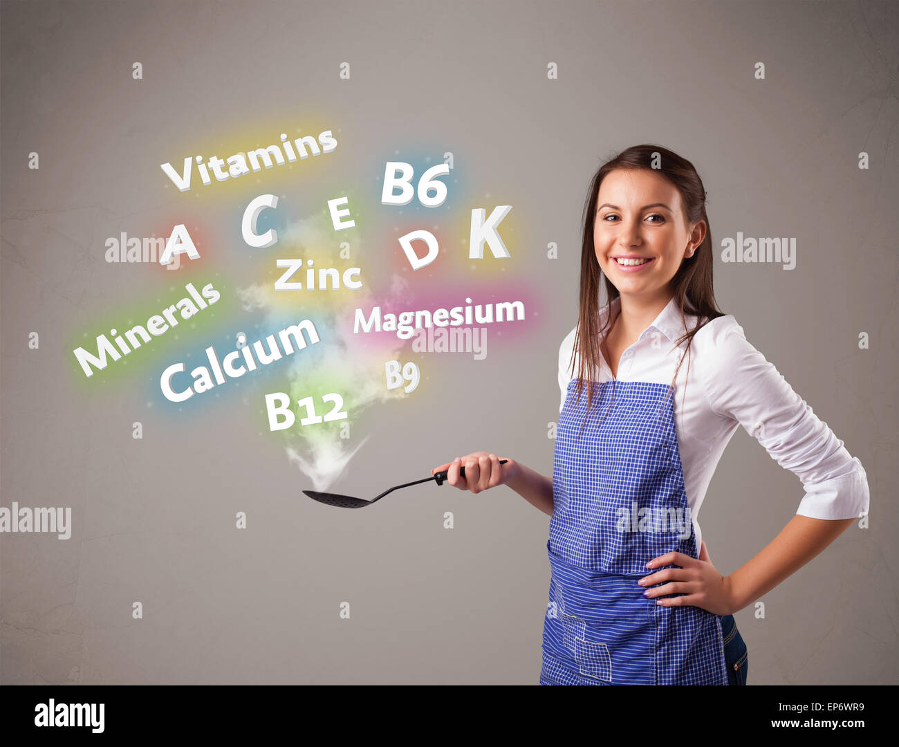 Young woman cooking vitamins and minerals Stock Photo - Alamy