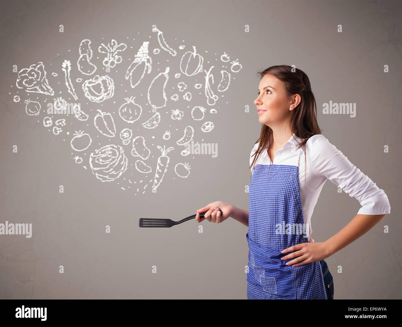 Woman cooking vegetables Stock Photo - Alamy